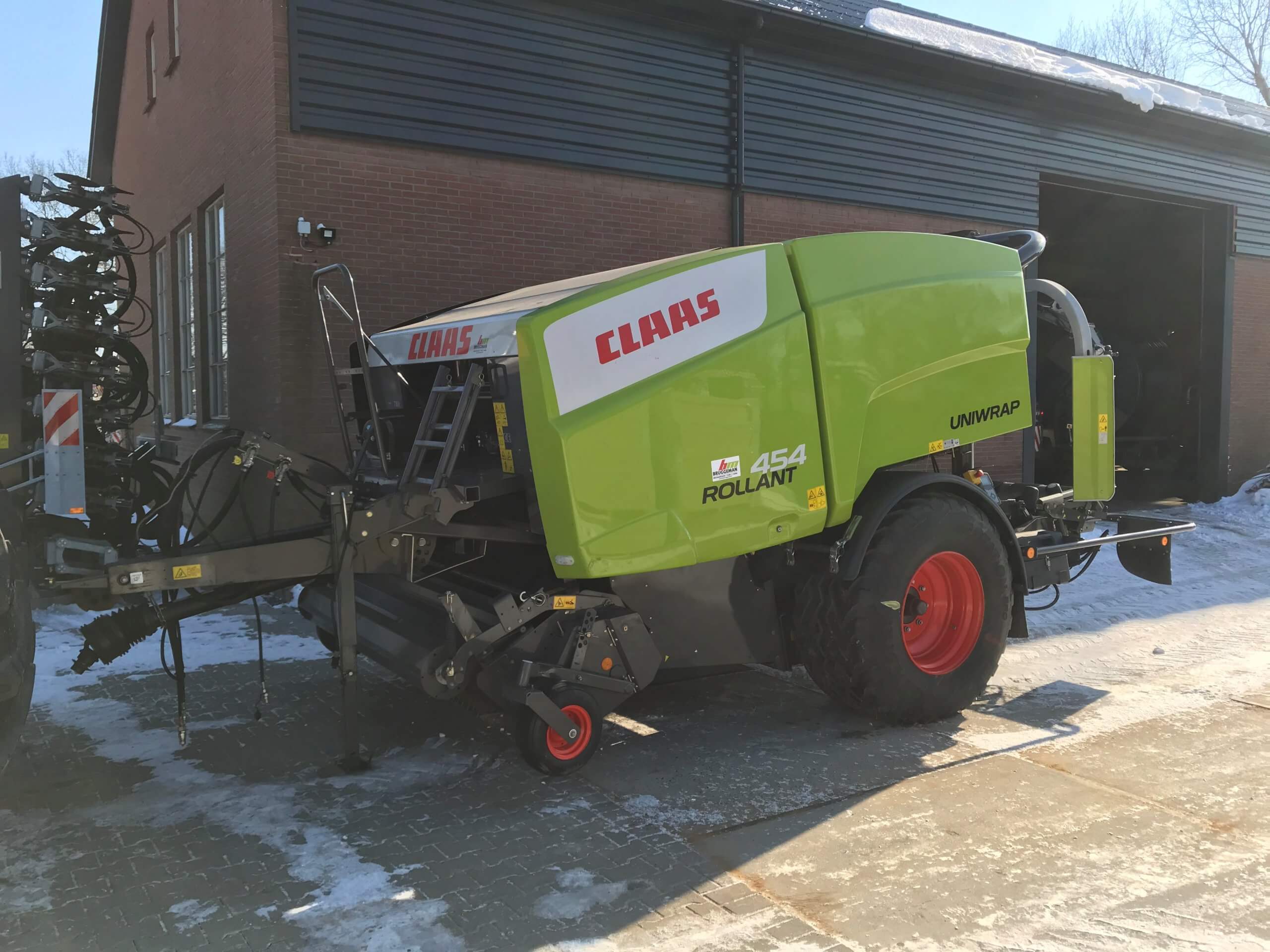 Afgeleverd: Claas Rolland 454 Uniwrap Afgeleverd. Bruggeman Mechanisatie